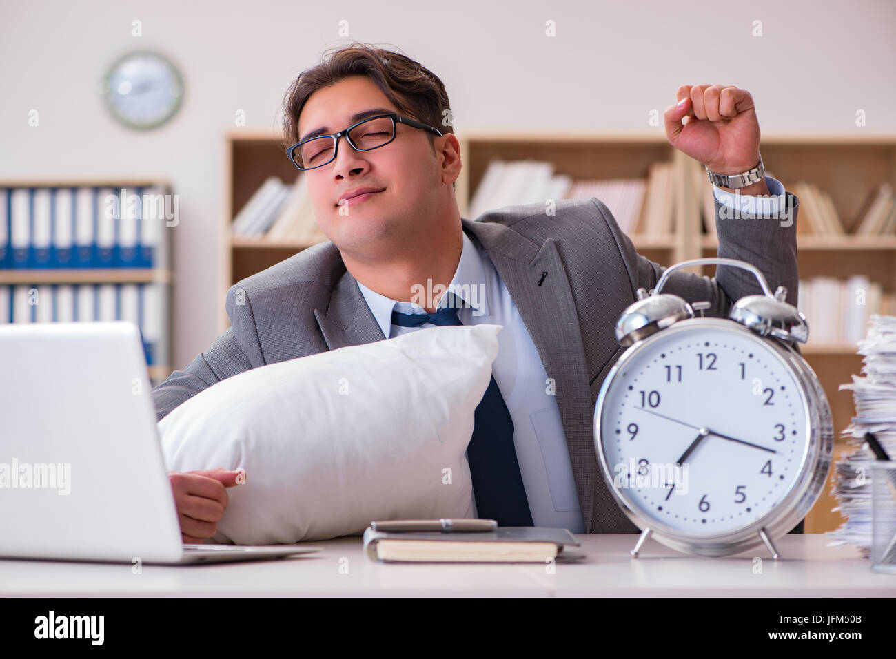 Tired man sleeping at home having too much work Stock Photo - Alamy