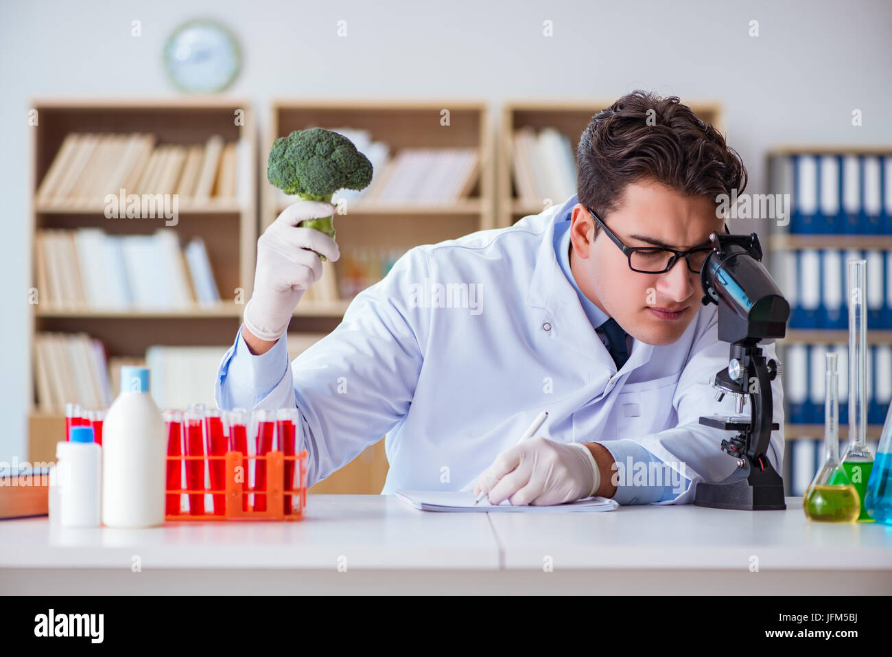 Scientist working on organic fruits and vegetables Stock Photo - Alamy