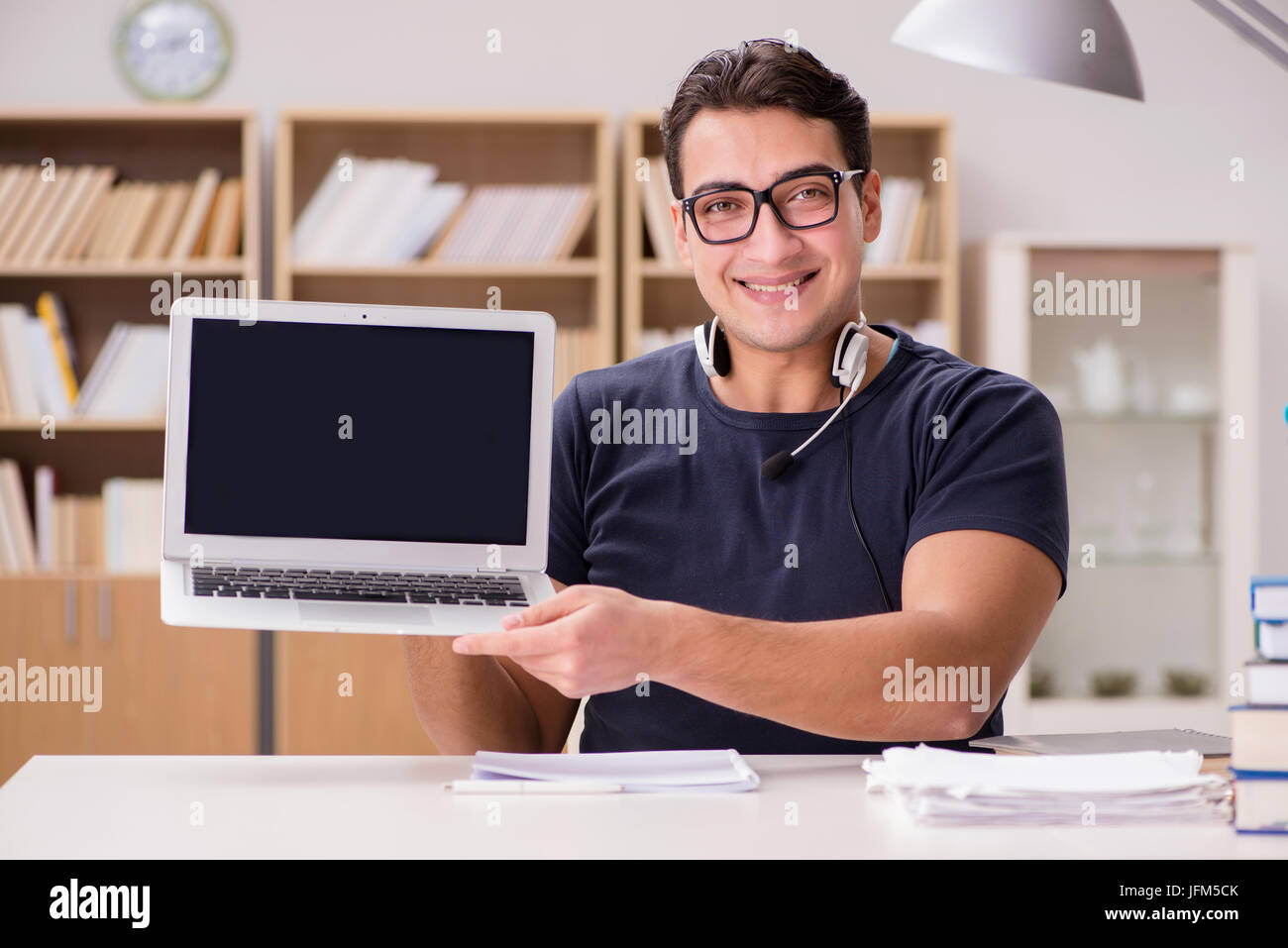 Young freelance worked working on computer Stock Photo - Alamy