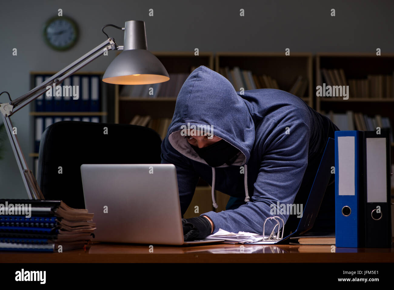 Hacker stealing personal data from home computer Stock Photo - Alamy
