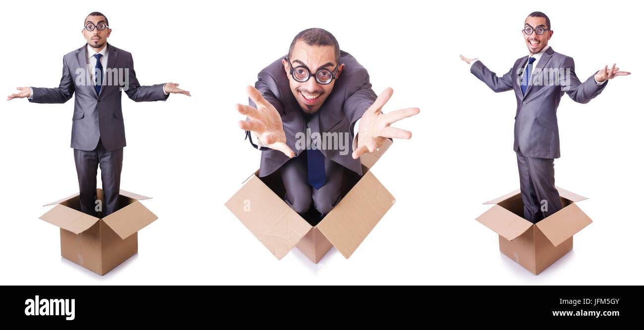Man in thinking outside the box concept Stock Photo - Alamy