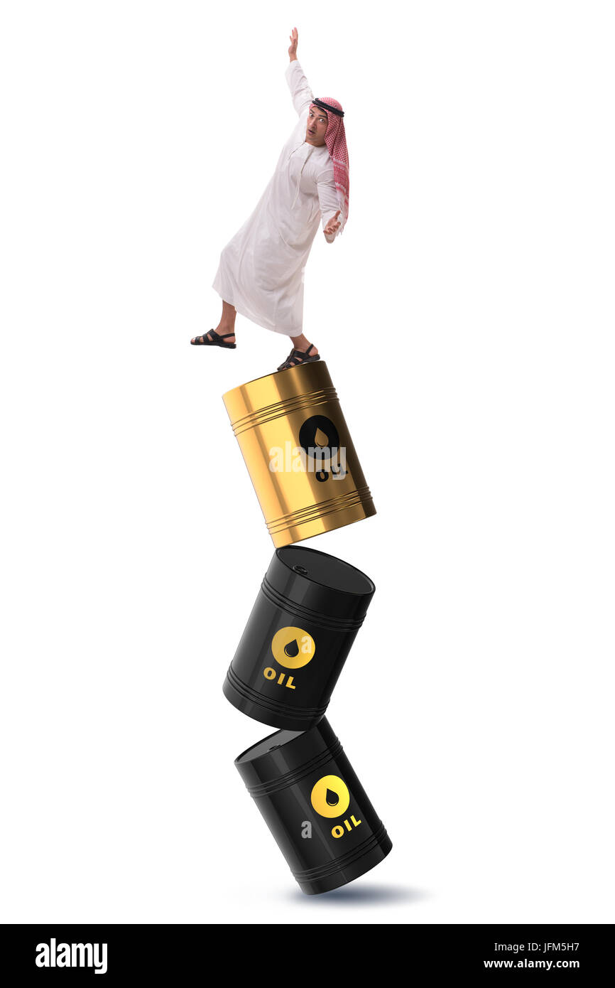 Arab businessman losing balance on oil barrels Stock Photo - Alamy