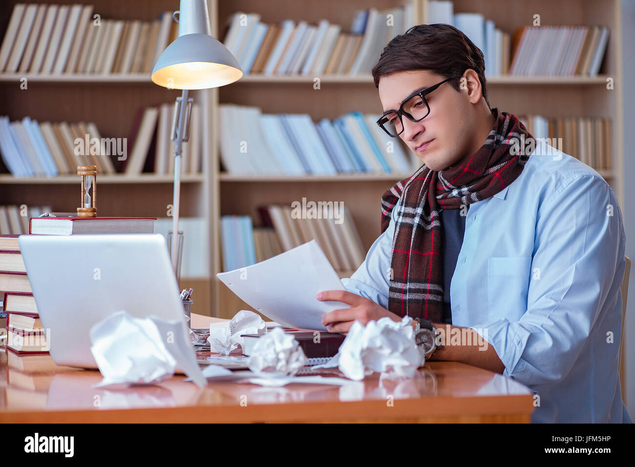 Professional journalist sitting in library hi-res stock photography and ...