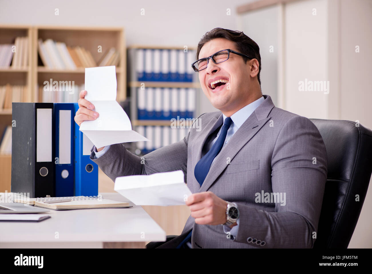 Businessman receiving letter in the office Stock Photo - Alamy