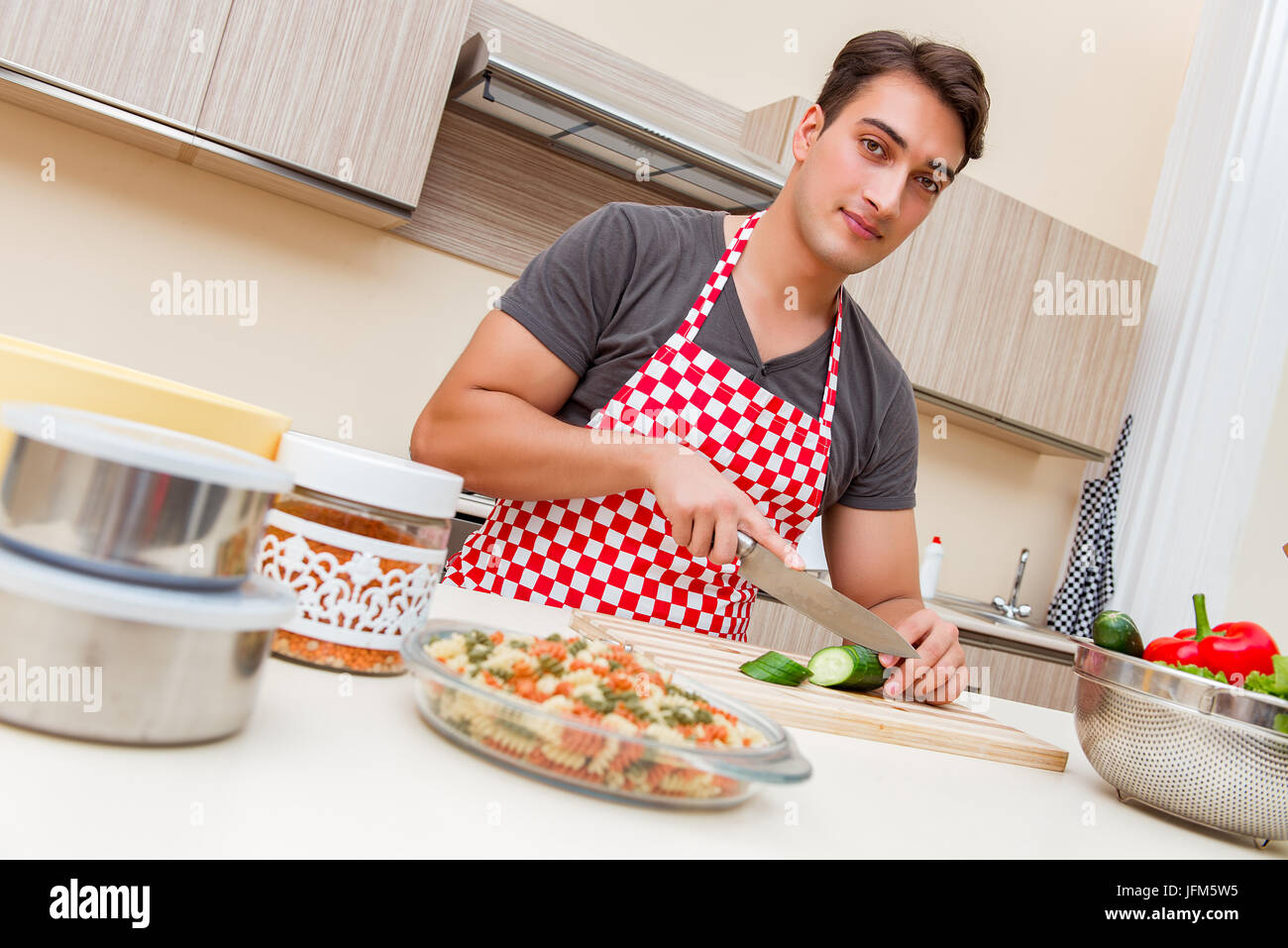 Man male cook preparing food in kitchen Stock Photo - Alamy