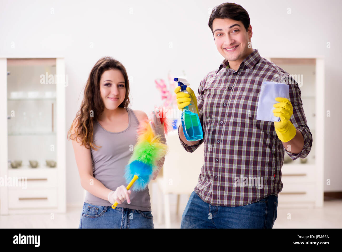 Wife husband doing cleaning home hi-res stock photography and images ...
