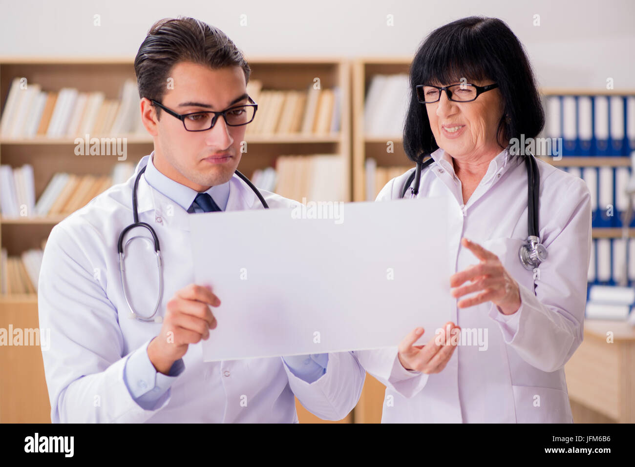 Two doctors in white lab hi-res stock photography and images - Alamy