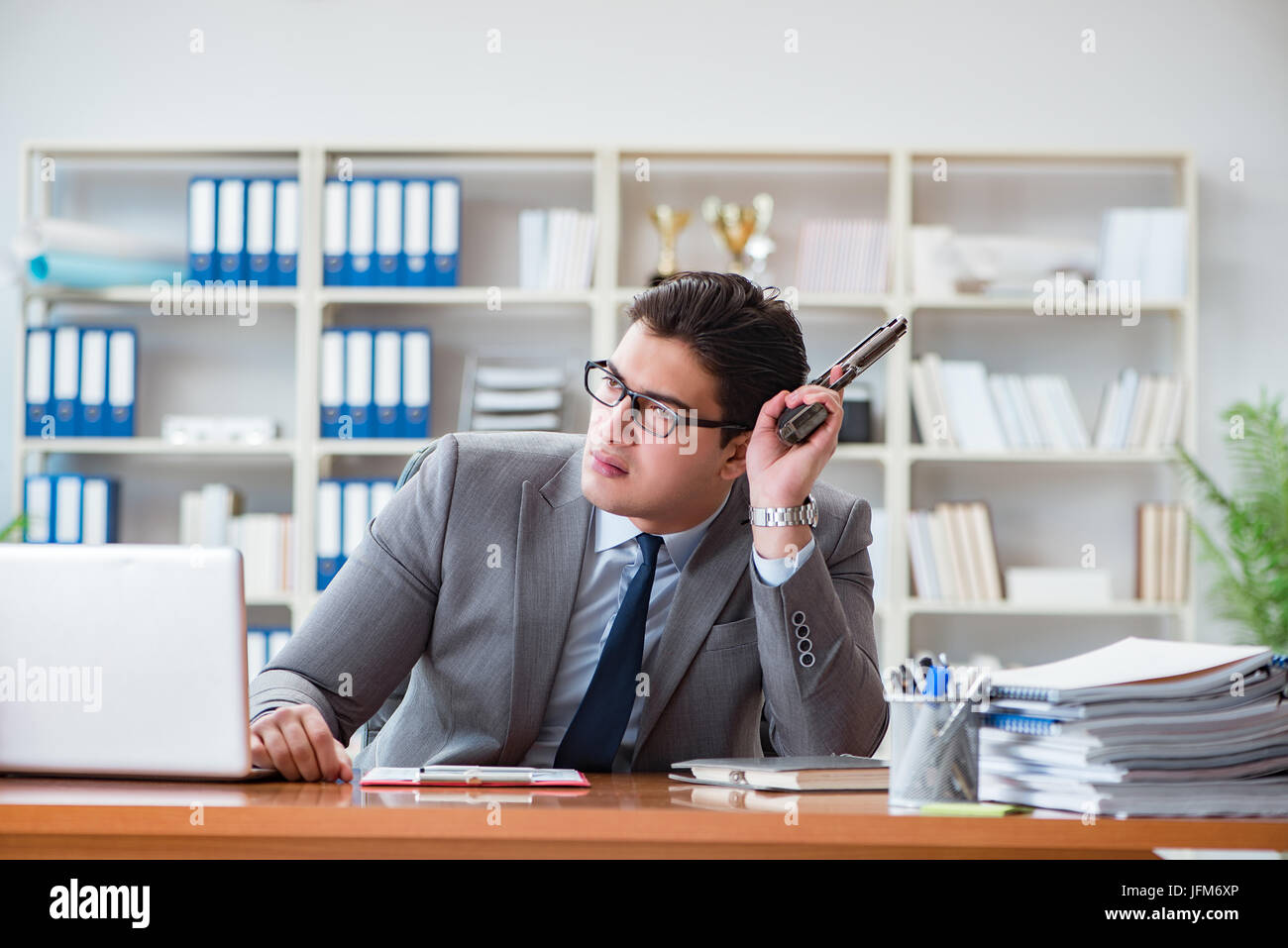 Angry aggressive businessman in the office Stock Photo - Alamy