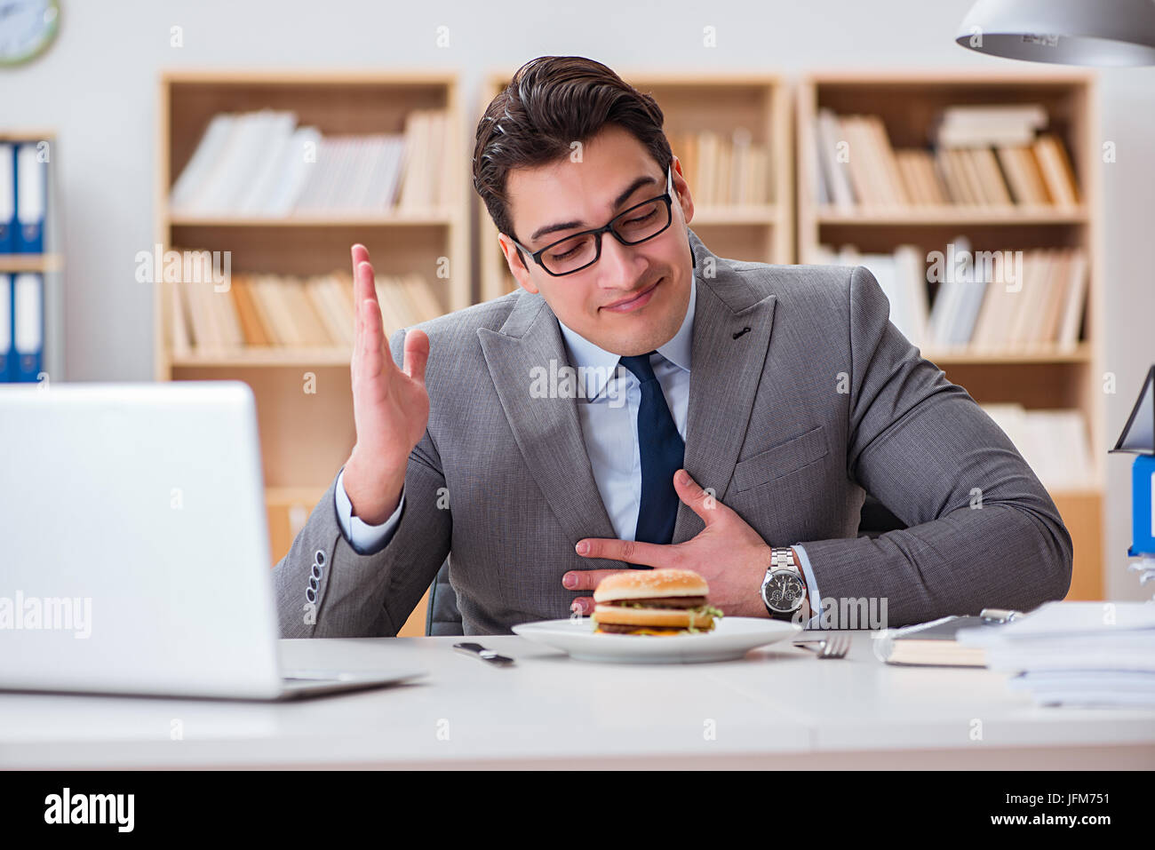 Computer laptop man hungry fast food fat eat funny hi-res stock ...