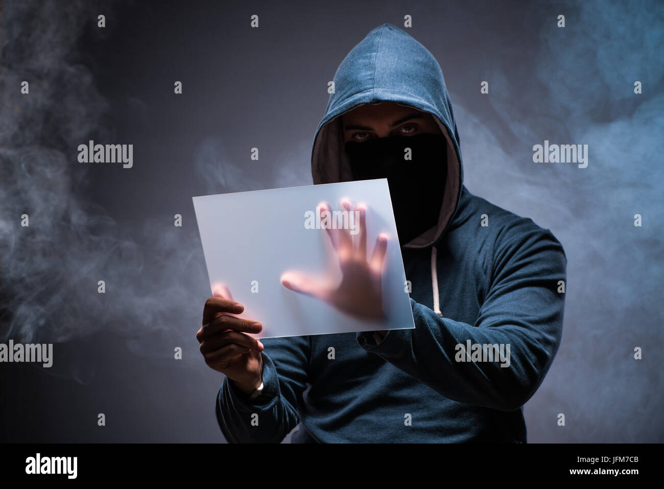 Hacker working on tablet hi-res stock photography and images - Alamy