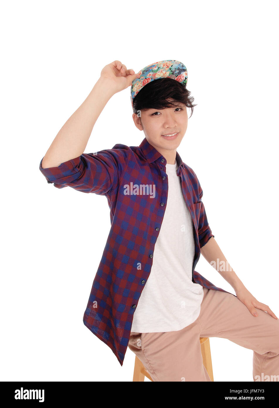 Handsome Asian man with cap Stock Photo - Alamy