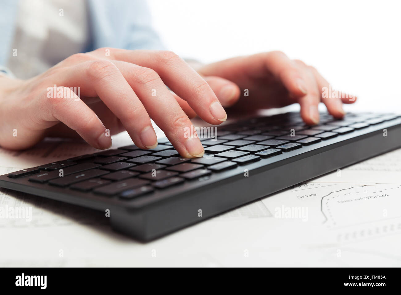 Business woman using computer keyboard Stock Photo - Alamy