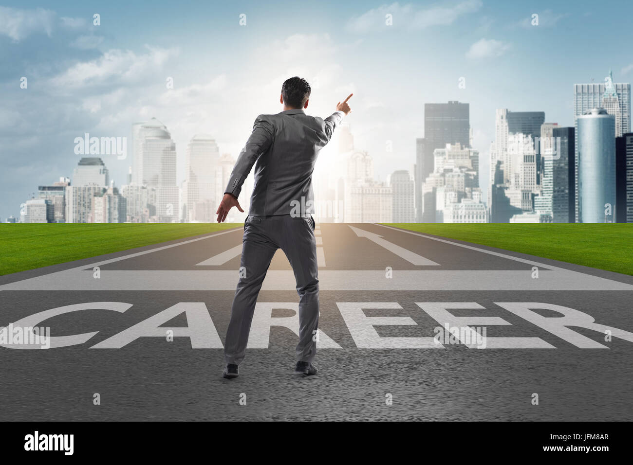 Businessman walking towards his career aspirations Stock Photo - Alamy