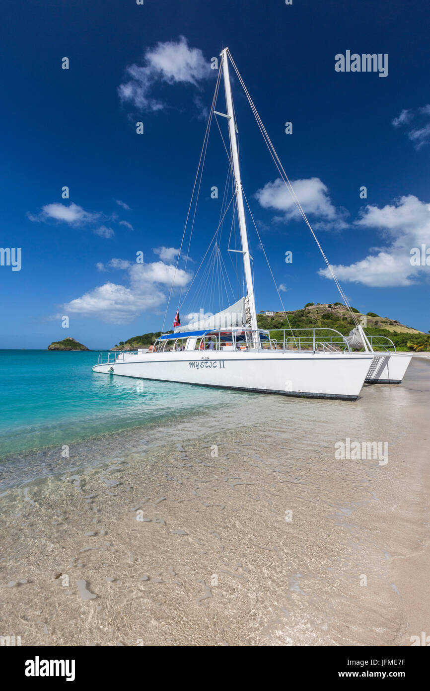 Catamaran on the fine sand beach facing the turquoise sea Deep Bay ...
