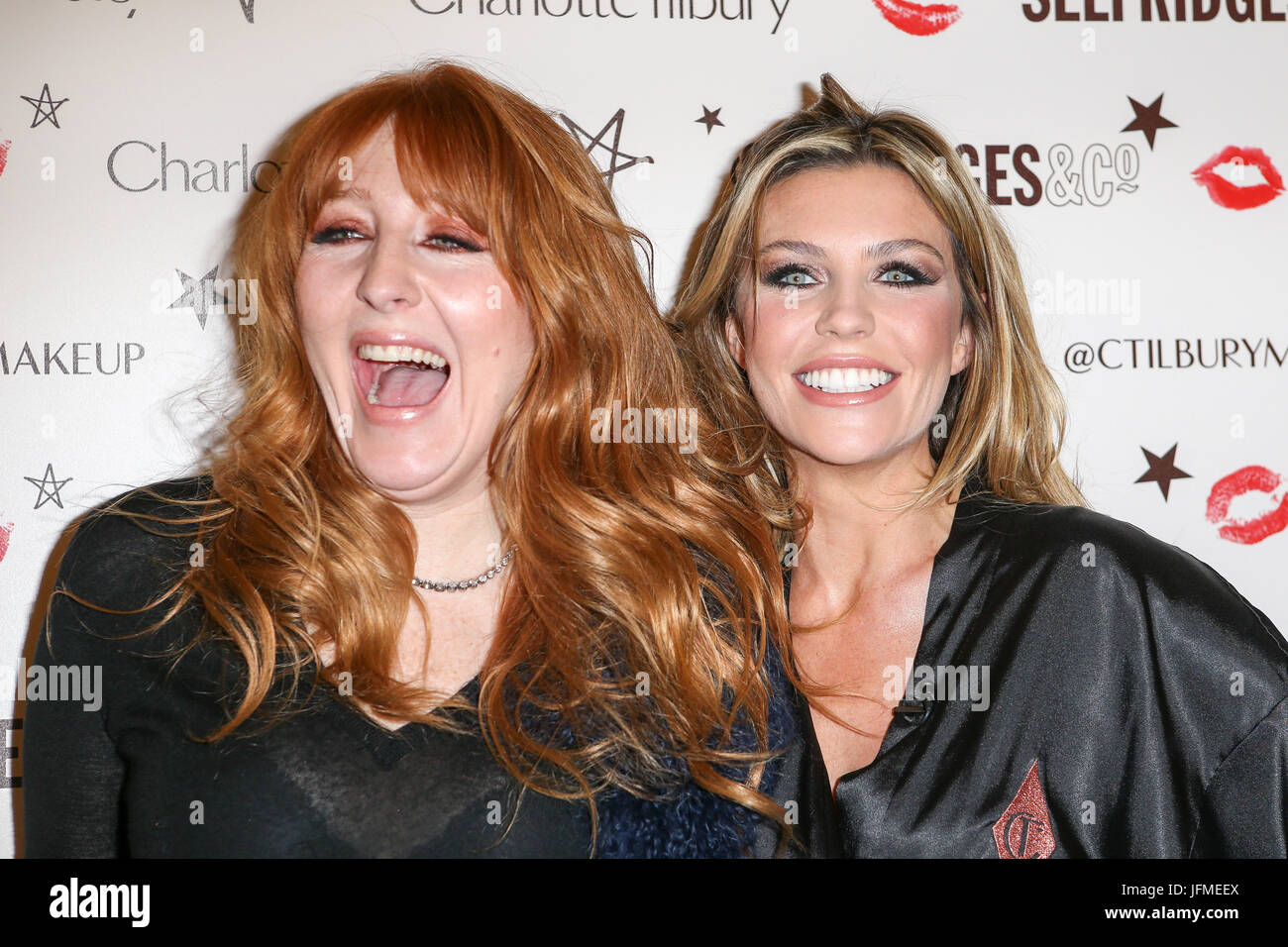 Charlotte Tilbury and Abbey Clancy - makeup demonstration Stock Photo ...