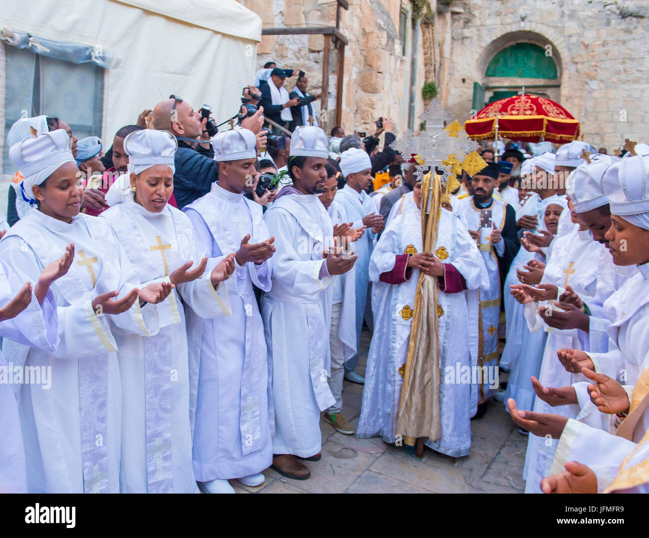 Ethiopian Orthodox pilgrims participates in the Holy fire ceremony at ...