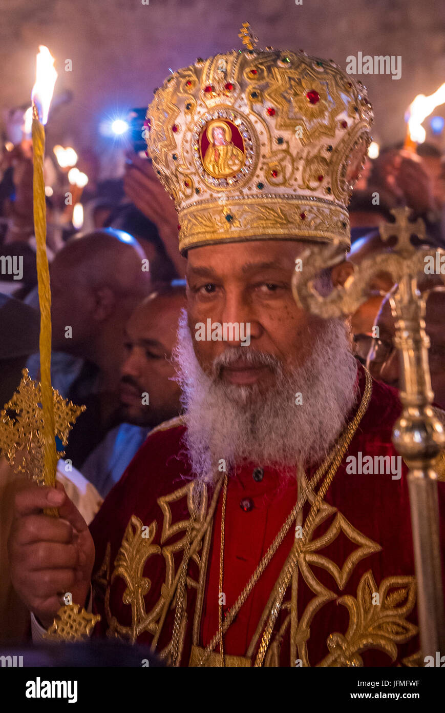Ethiopian Orthodox pilgrim participates in the Holy fire ceremony at ...