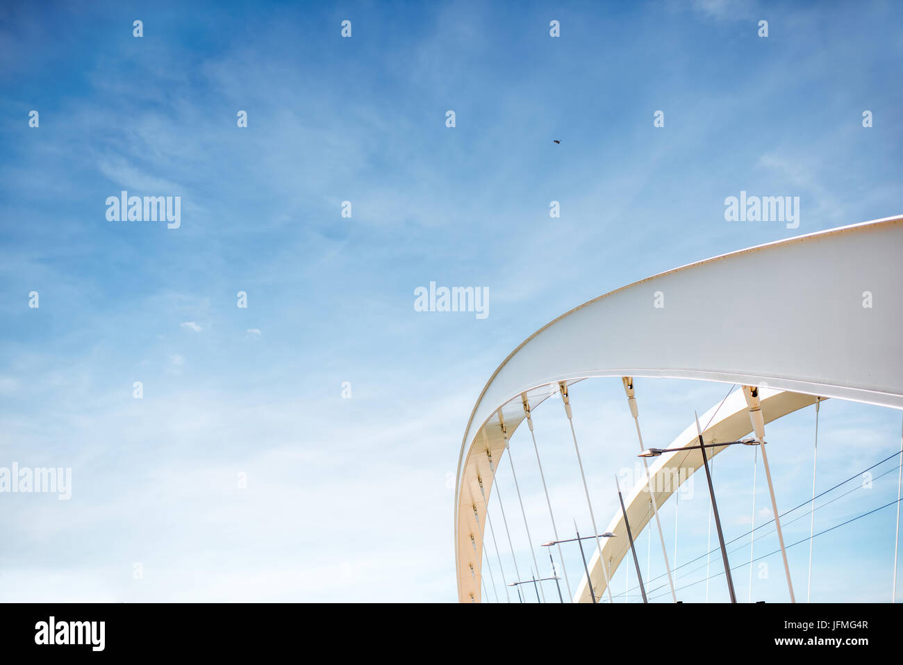 Modern bridge on the sky background Stock Photo - Alamy