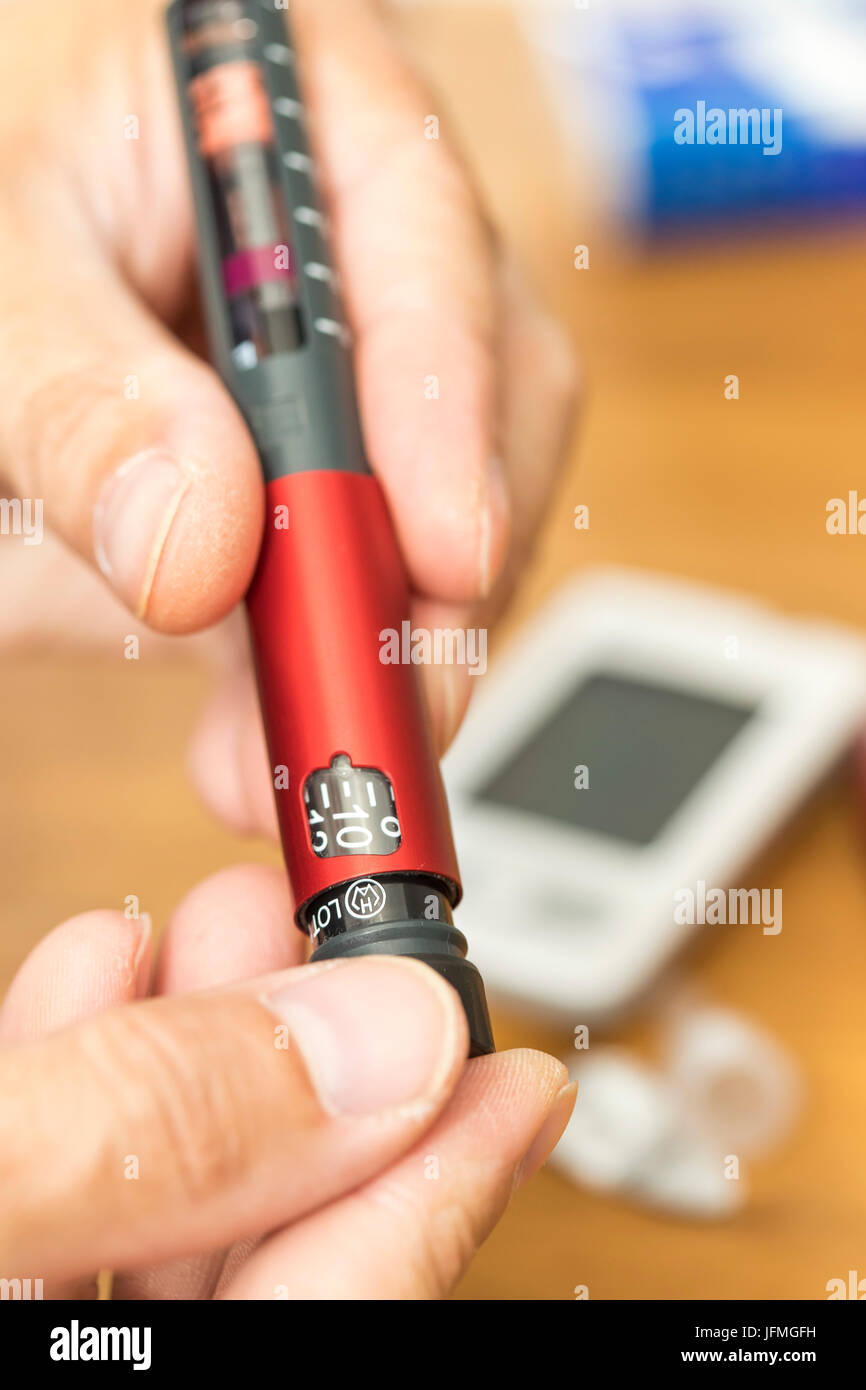 Diabetes, blood glucose meter, lancing device and insulin pen Stock ...