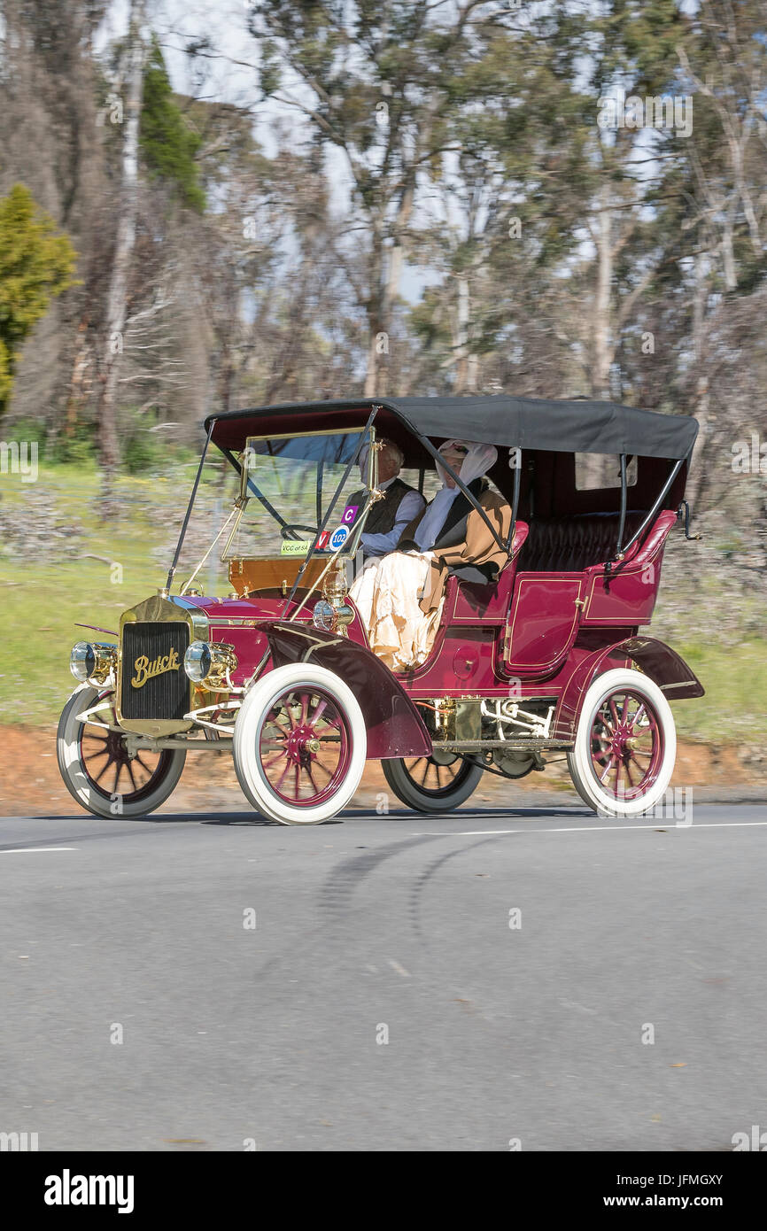 Vintage 1906 Buick F Tourer driving on country roads near the town of ...