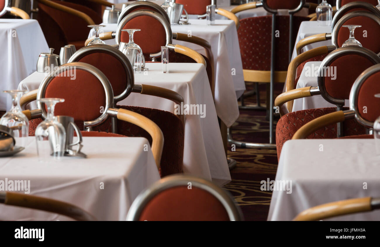 Empty dining tables set hi-res stock photography and images - Alamy