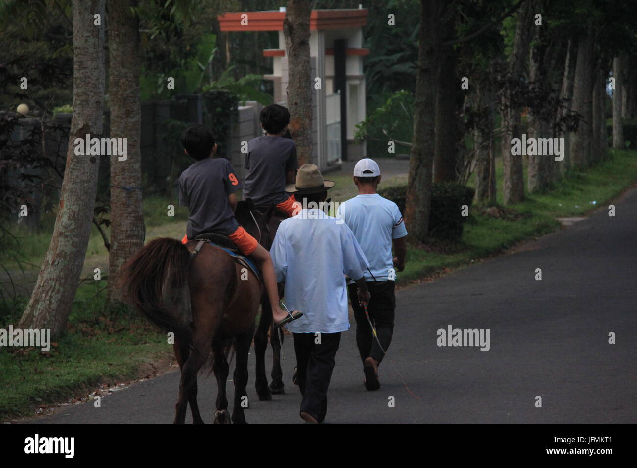 Children horse riding indonesia hi-res stock photography and images - Alamy