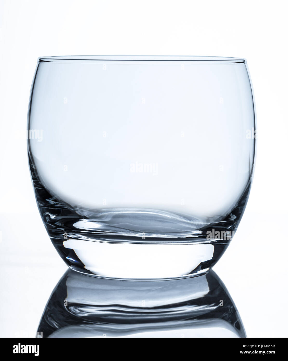 Empty glass with reflection on white background Stock Photo - Alamy
