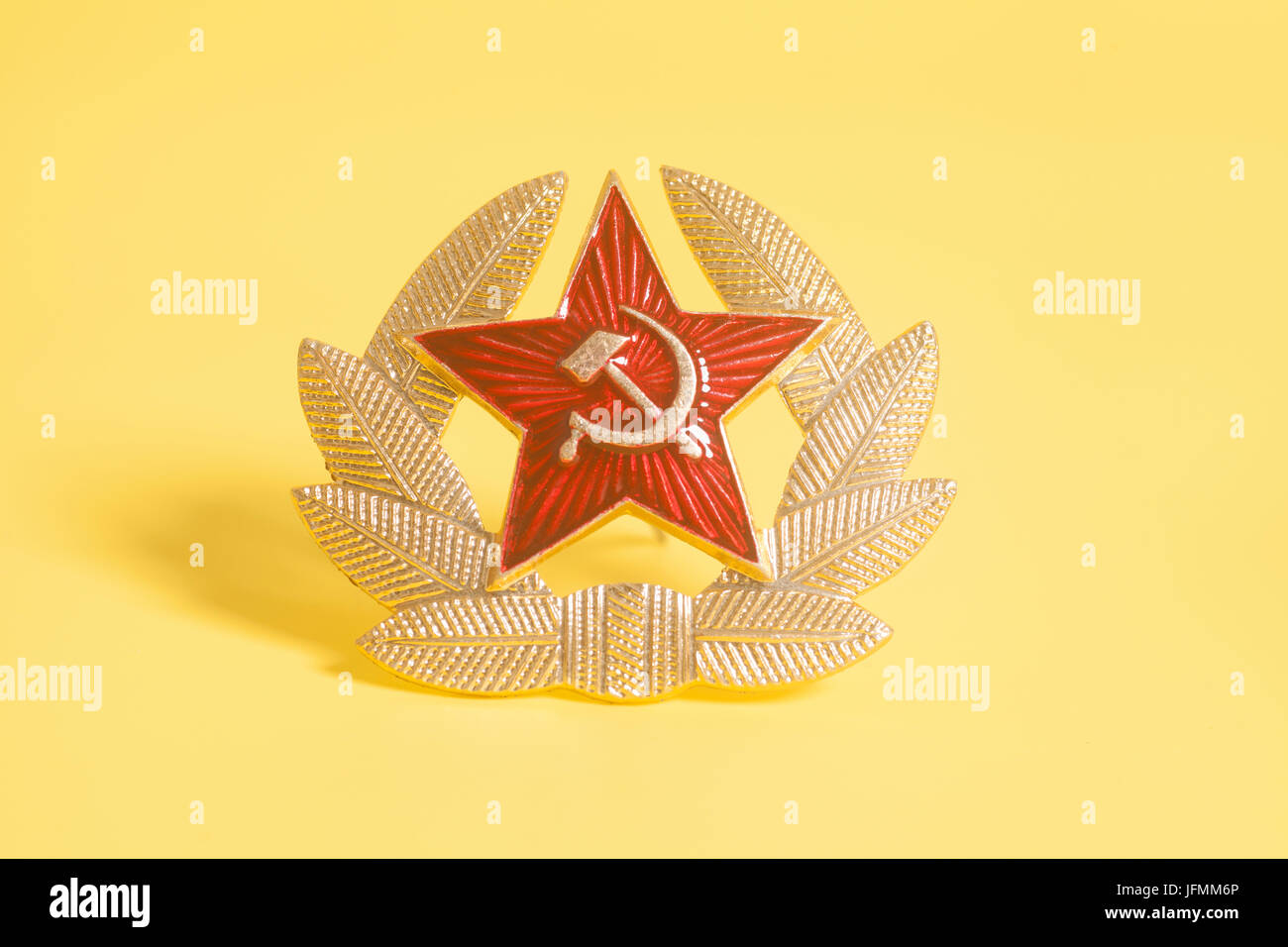 Soviet (ussr) star and laurel wreath on yellow Stock Photo - Alamy