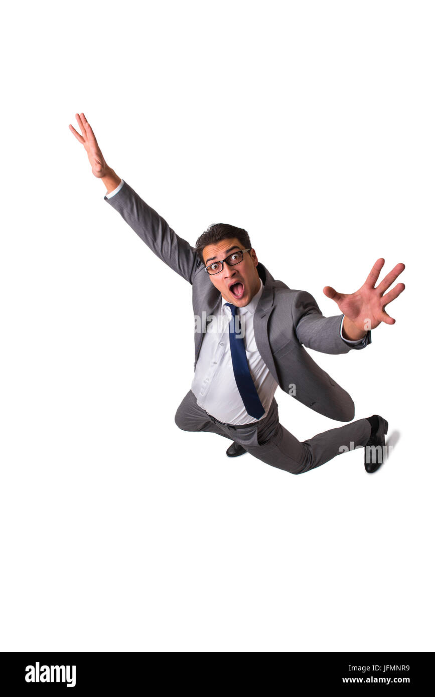 Falling businessman isolated on the white background Stock Photo - Alamy