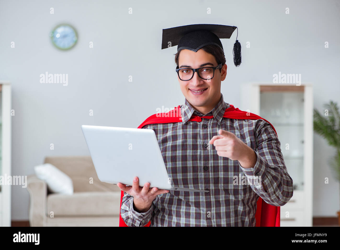 Super hero student with books studying for exams Stock Photo - Alamy