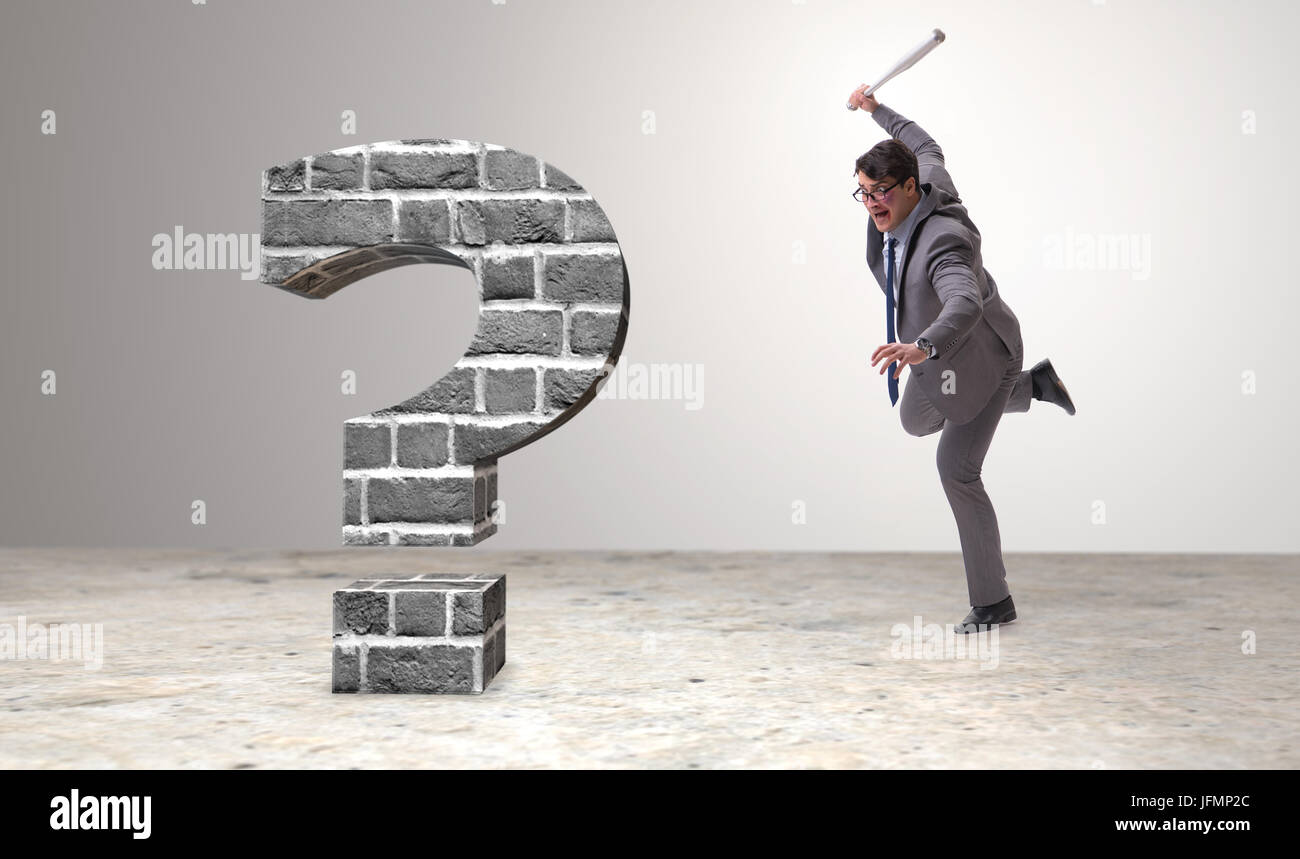 Angry man with baseball bat hitting question mark Stock Photo - Alamy