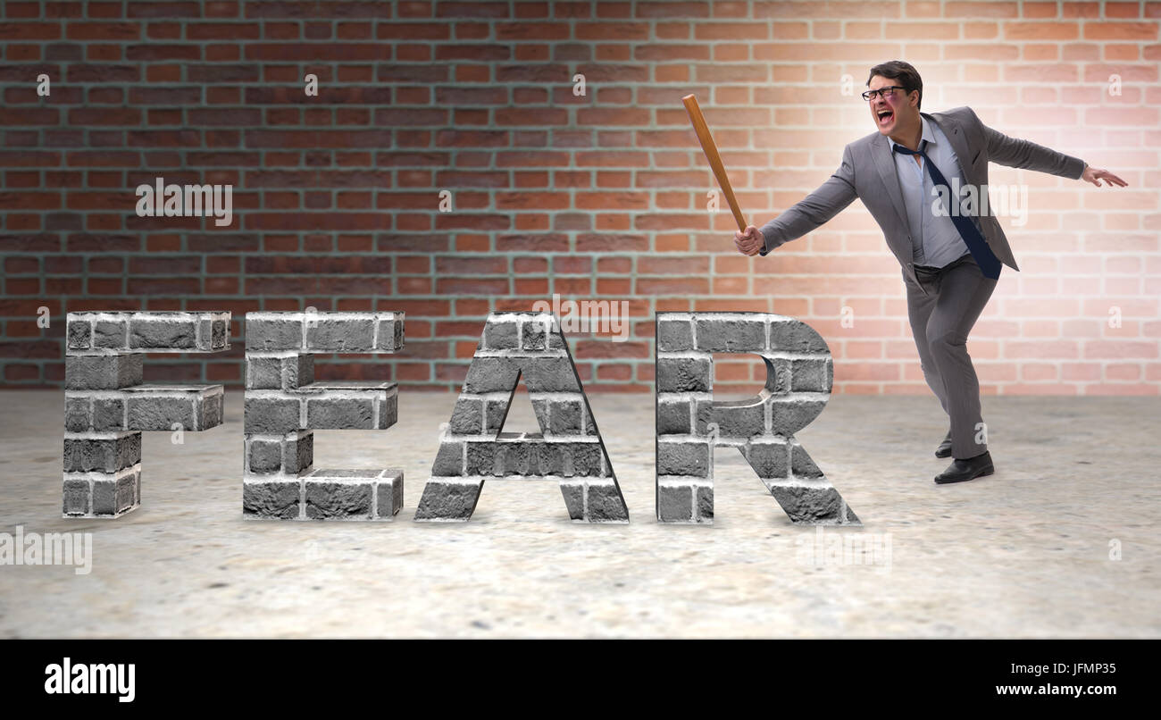 Angry man with baseball bat hitting fear word Stock Photo - Alamy