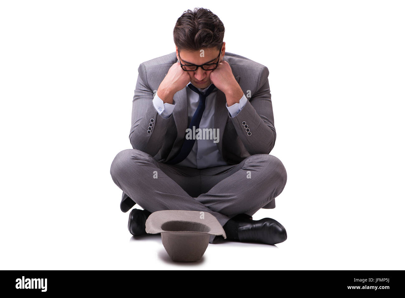 Bankrupt businessman isolated on white background Stock Photo - Alamy