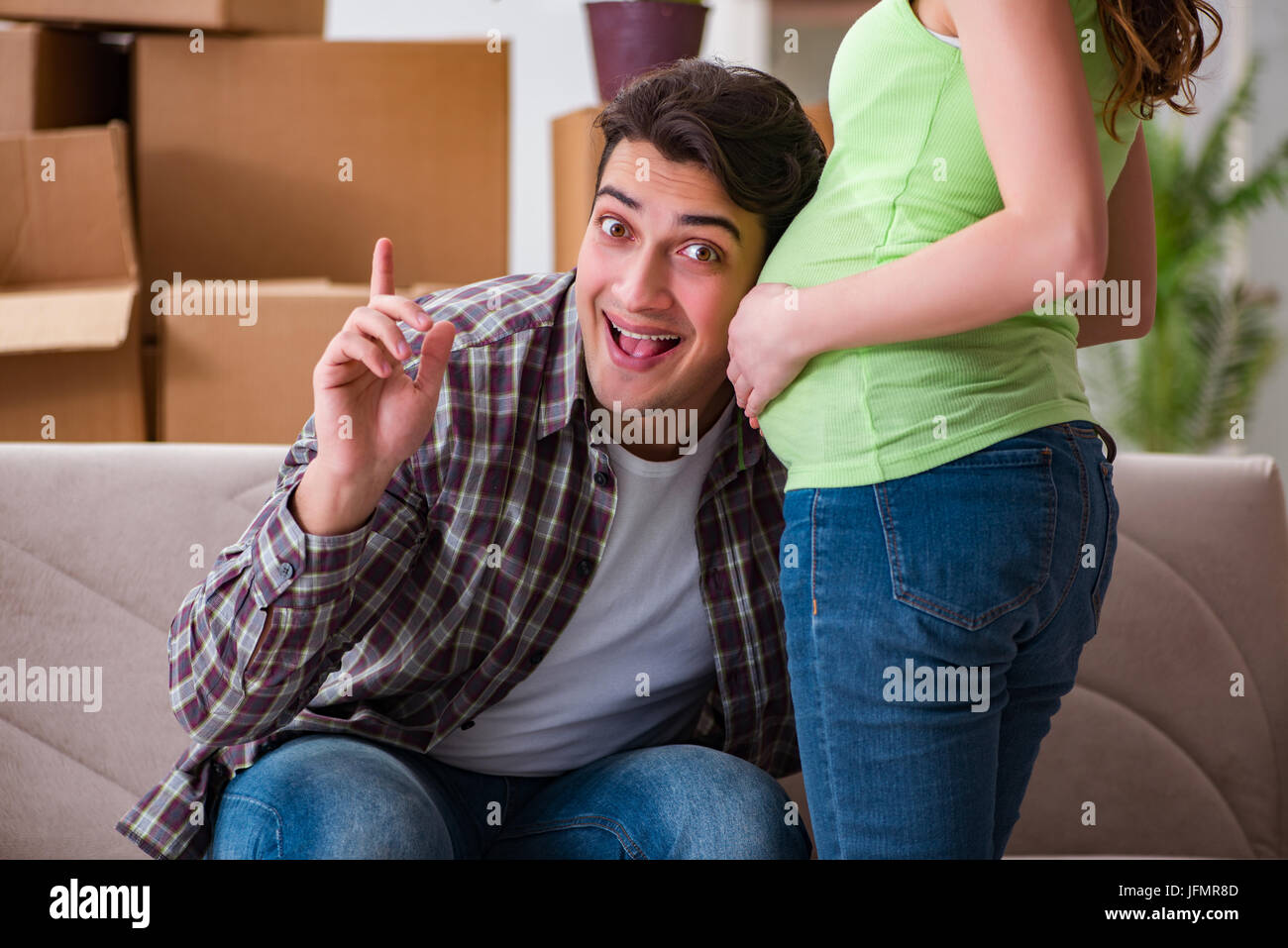 Young couple of man and pregnant wife expecting baby Stock Photo - Alamy