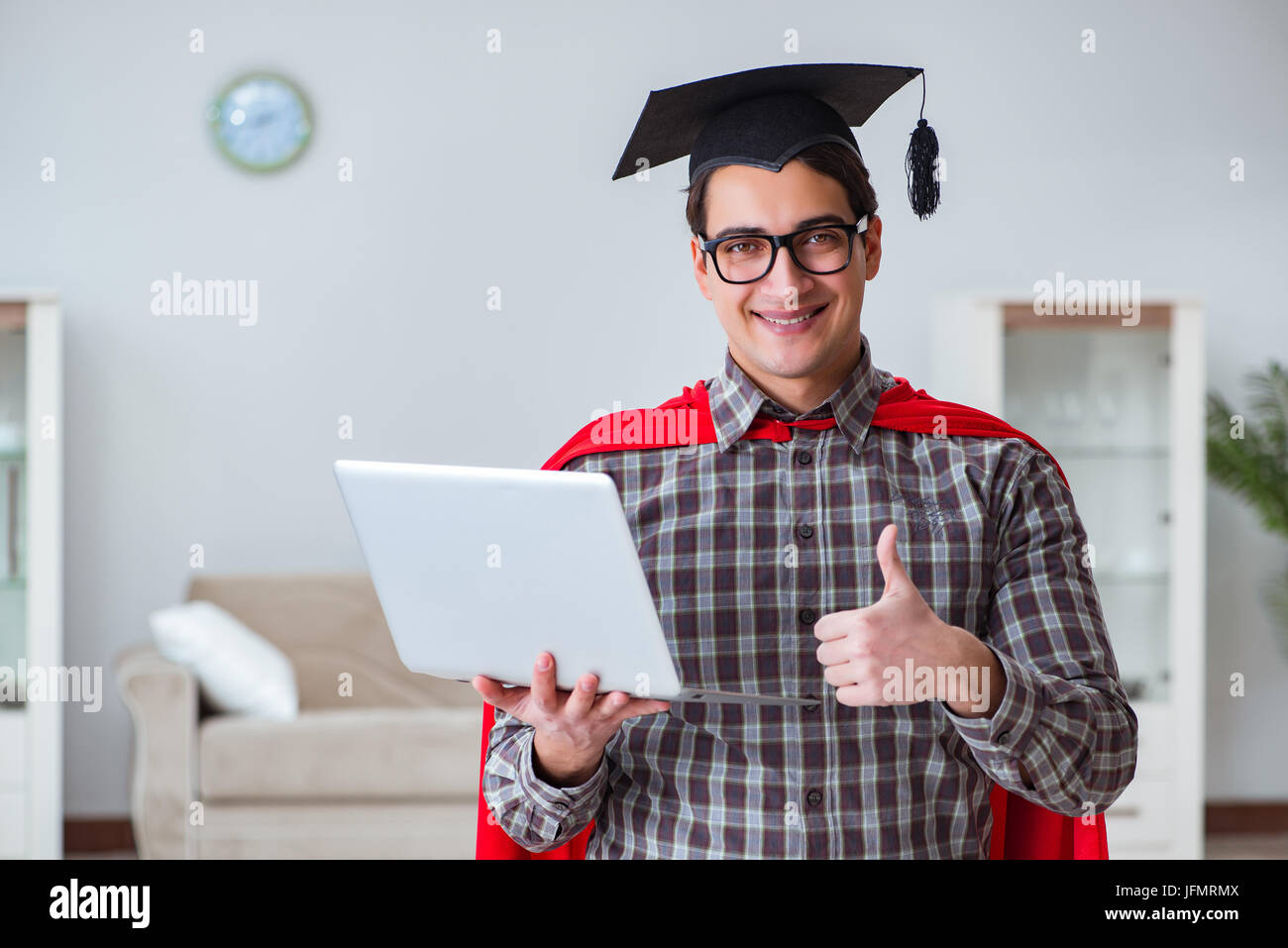 Super hero student with books studying for exams Stock Photo - Alamy