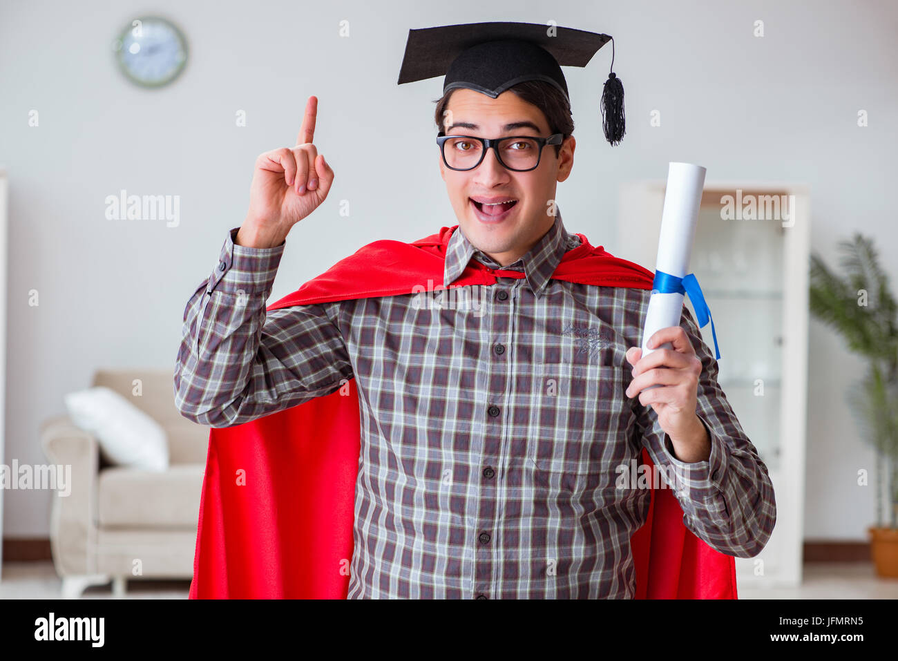 Super hero student with books studying for exams Stock Photo - Alamy