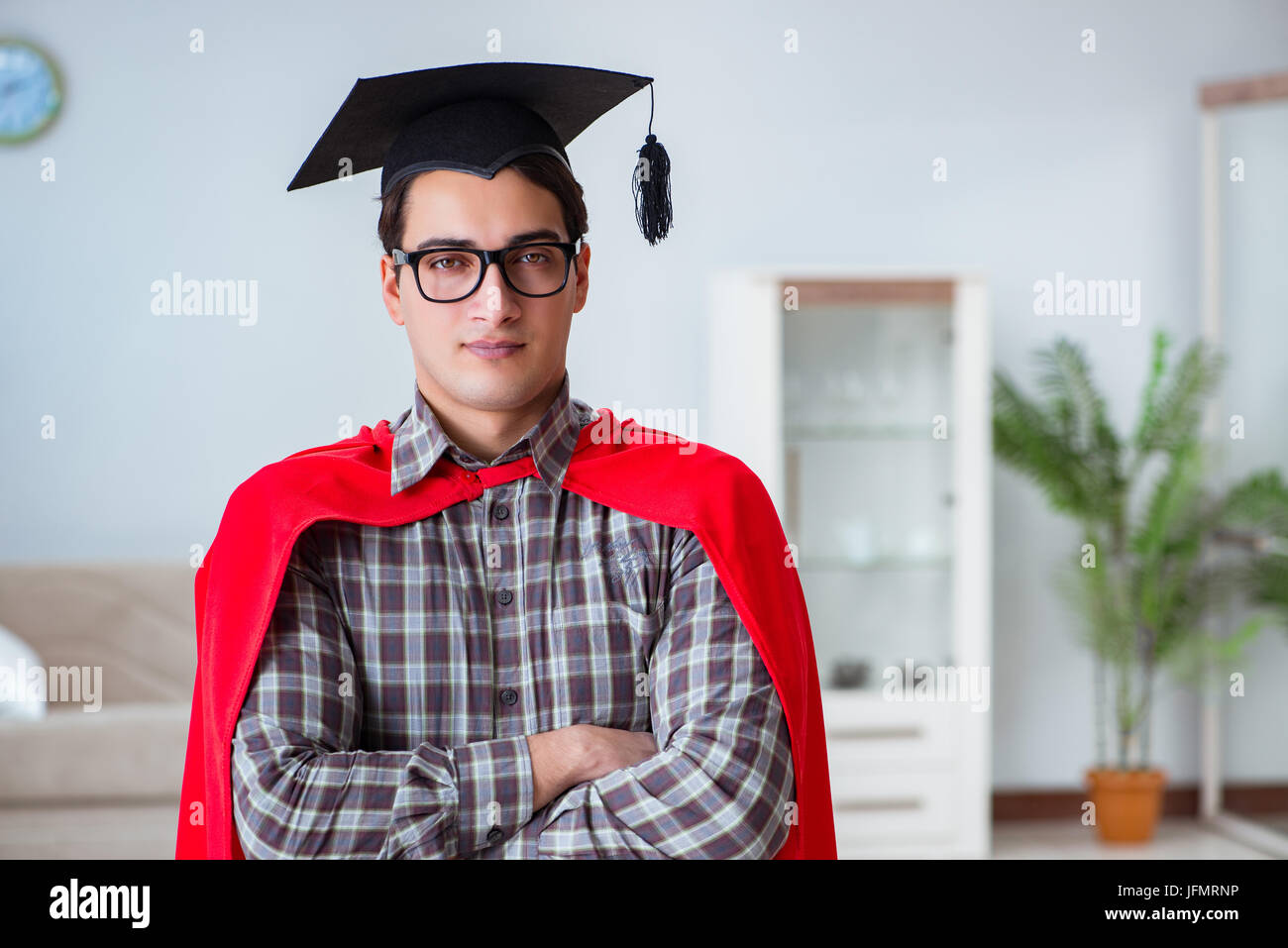 Super hero student with books studying for exams Stock Photo - Alamy