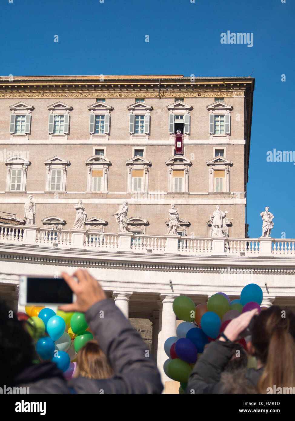 Taking pictures of Pope Francis at the Vatican window during Sunday ...