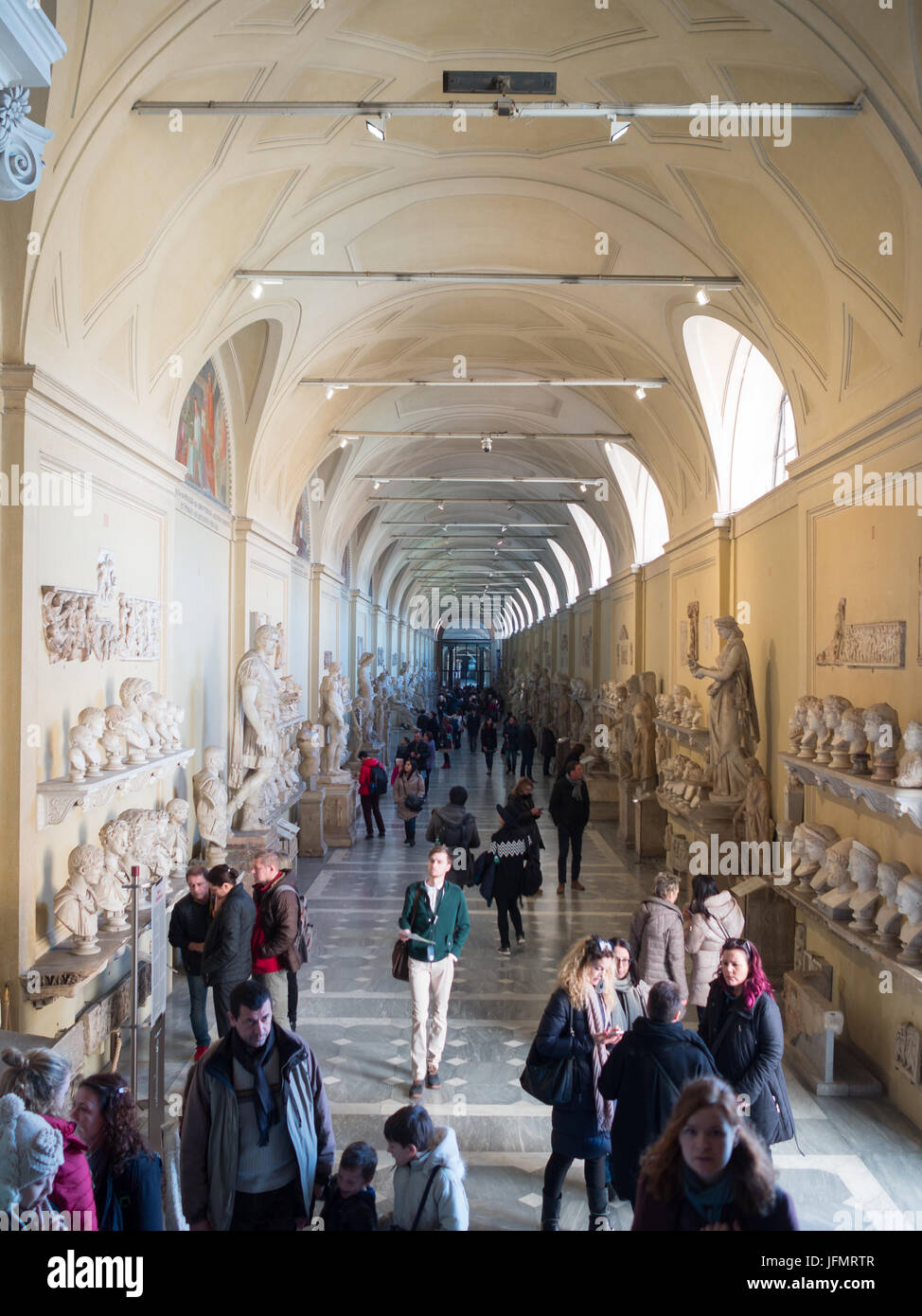 Visitors to the Vatican Museum in a sculpture hall Stock Photo - Alamy