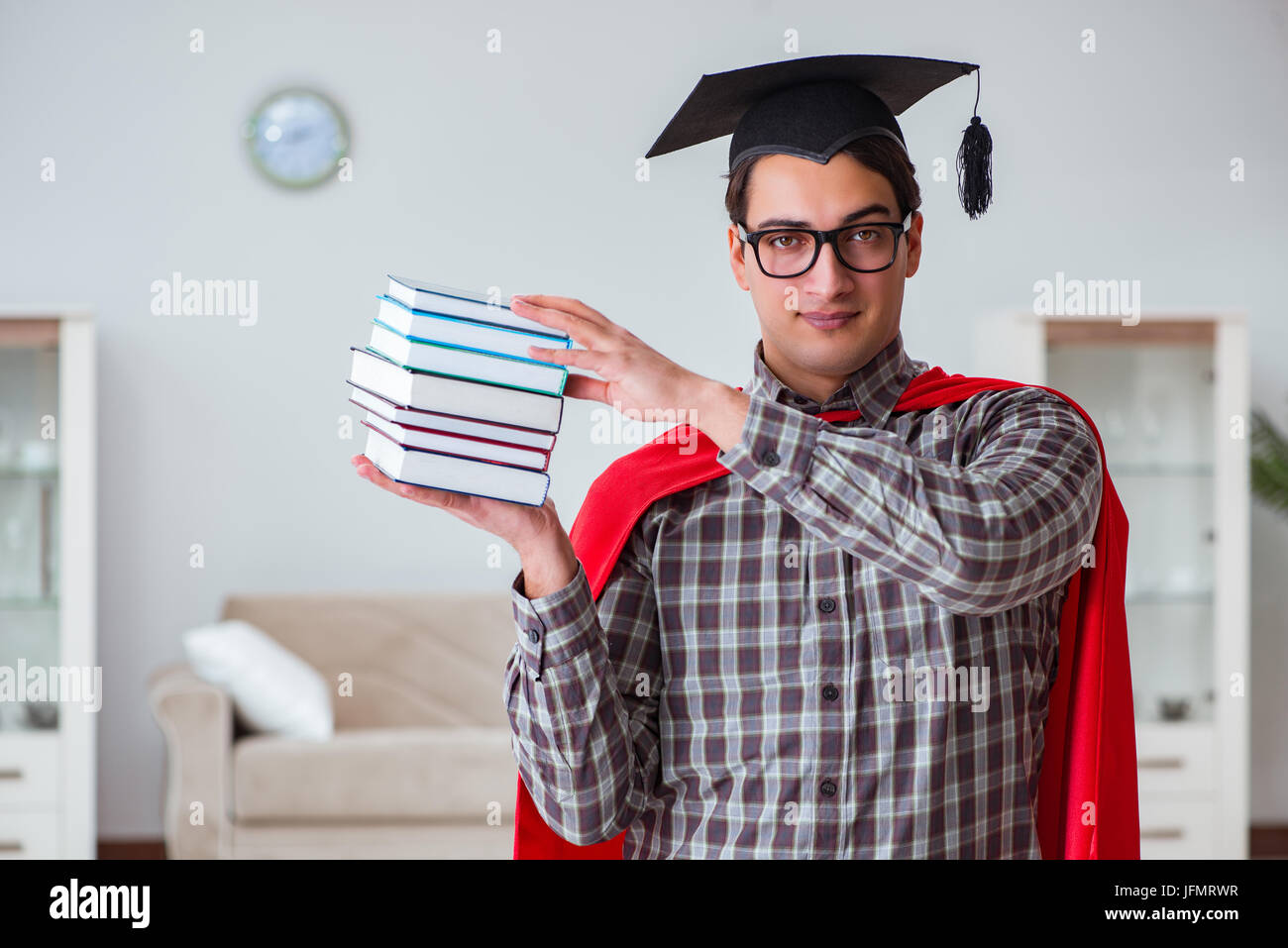 Super hero student with books studying for exams Stock Photo - Alamy