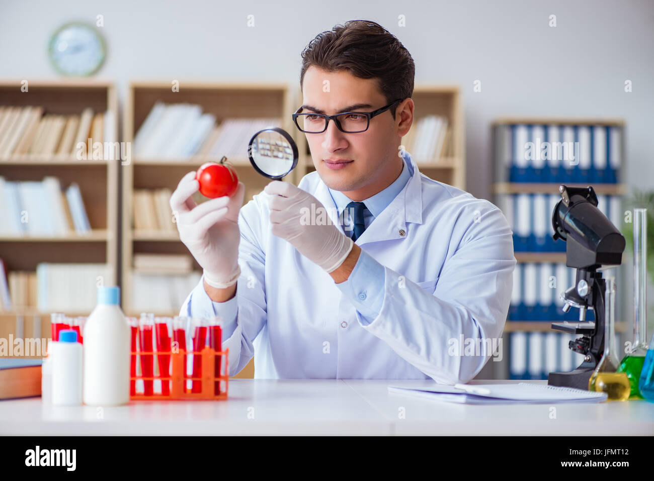 Scientist working on organic fruits and vegetables Stock Photo - Alamy
