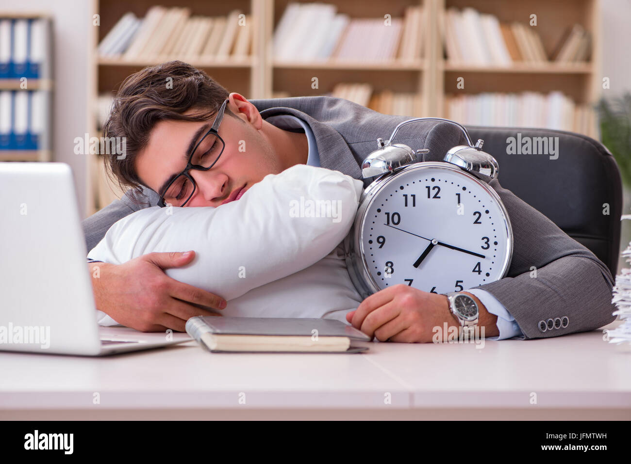 Tired man sleeping at home having too much work Stock Photo - Alamy