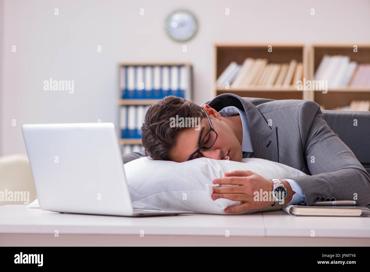 Tired man sleeping at home having too much work Stock Photo - Alamy