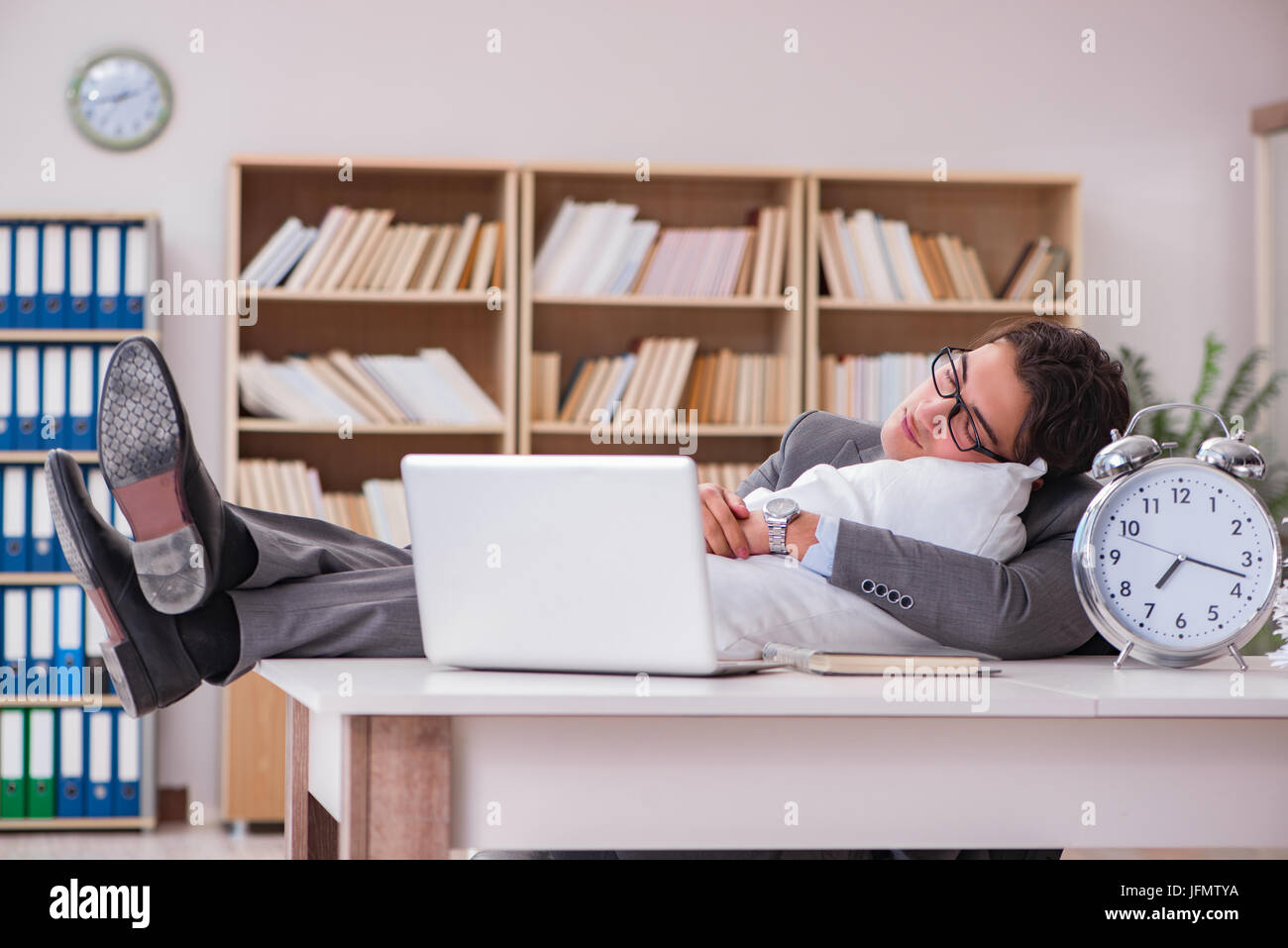 Tired man sleeping at home having too much work Stock Photo - Alamy