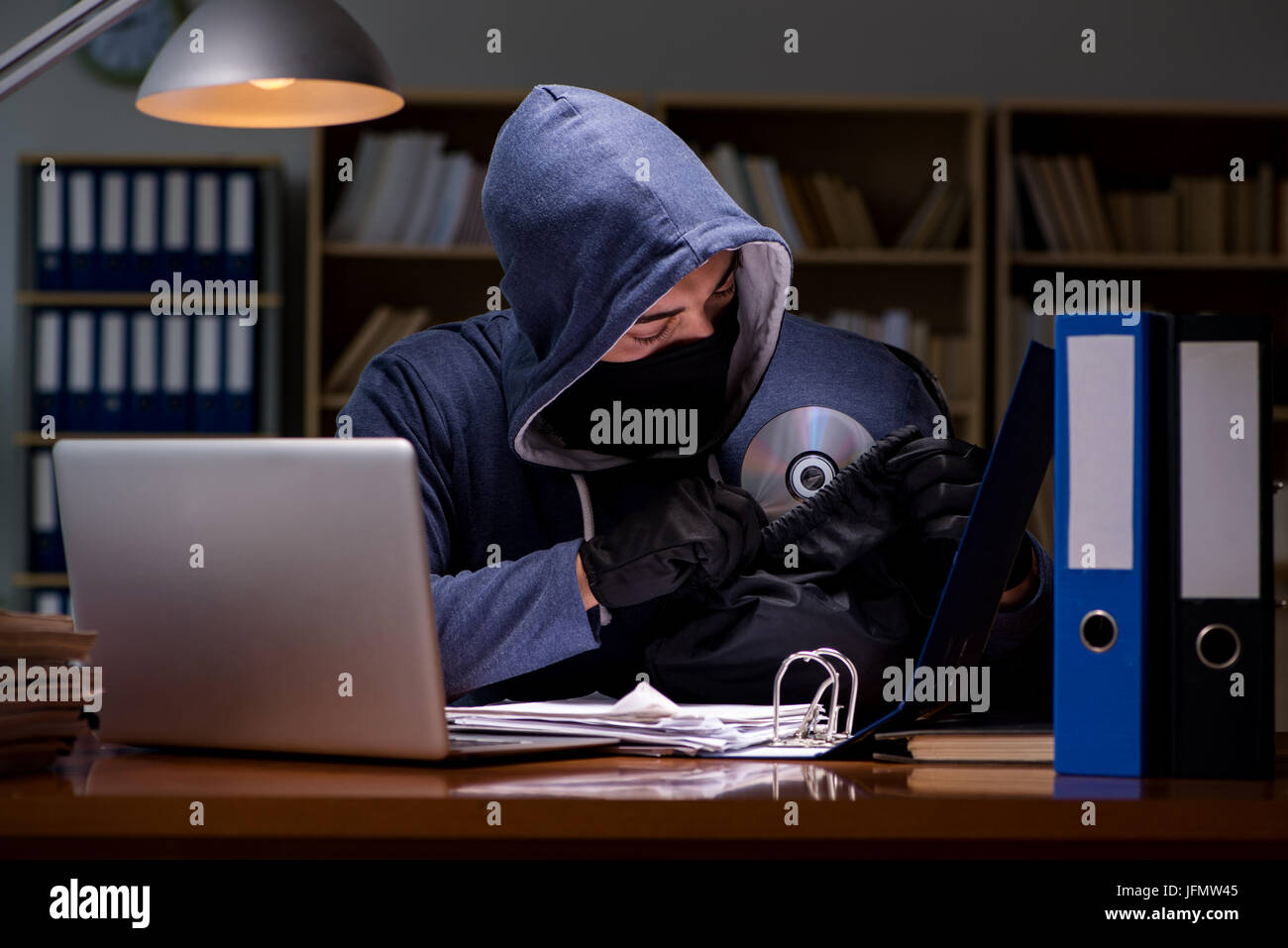 Hacker stealing personal data from home computer Stock Photo - Alamy