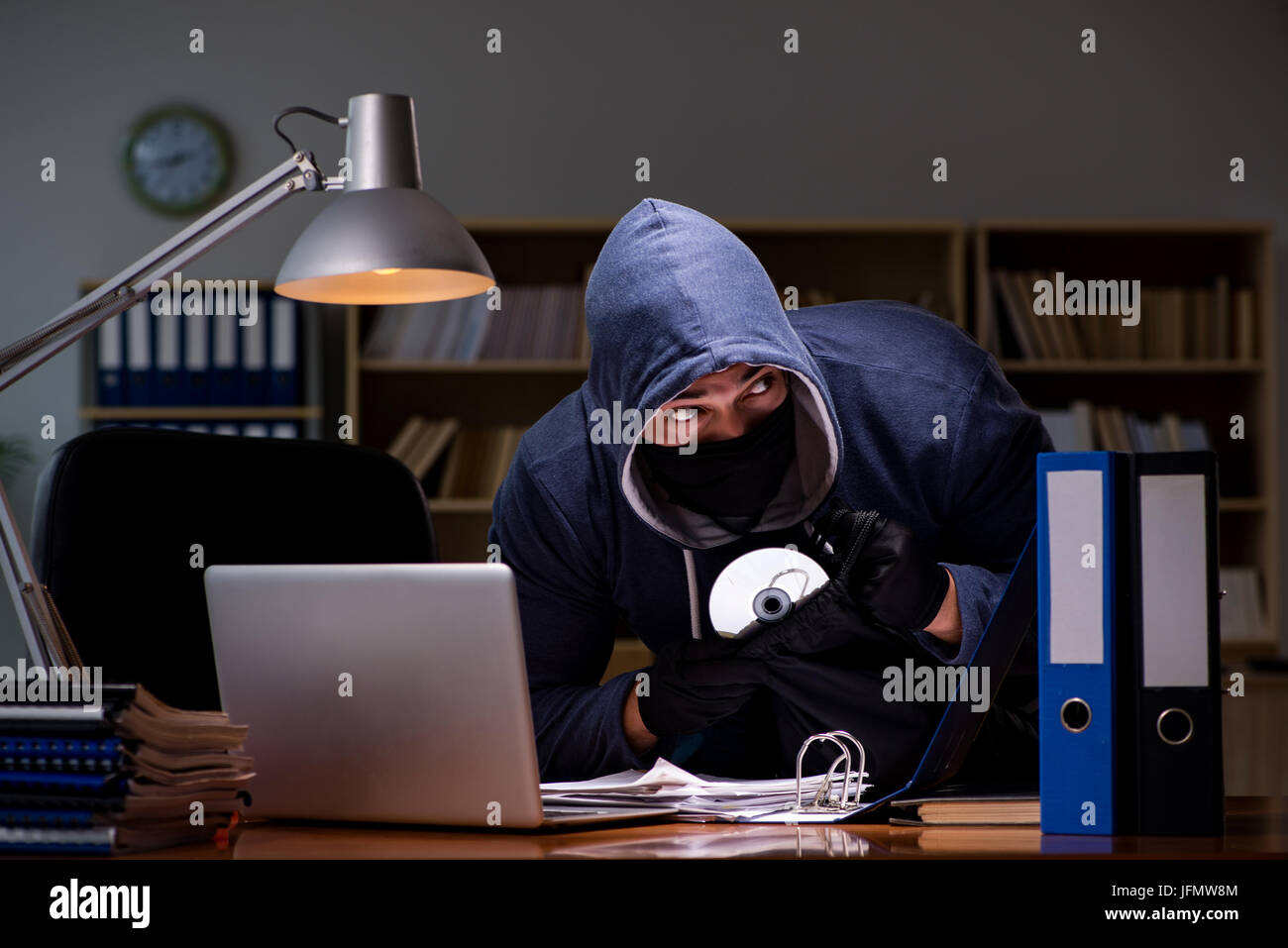 Hacker stealing personal data from home computer Stock Photo - Alamy
