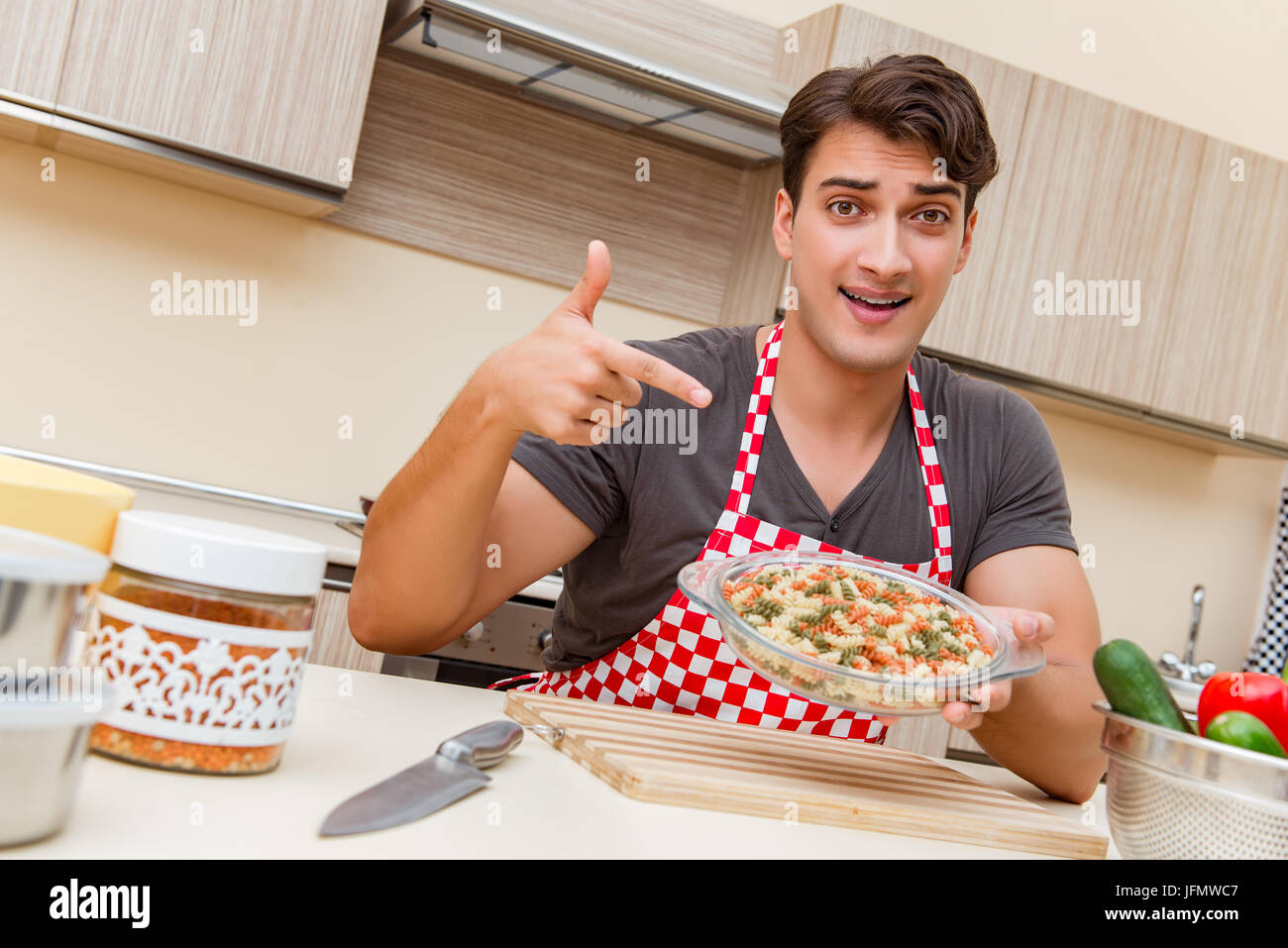 Man male cook preparing food in kitchen Stock Photo - Alamy