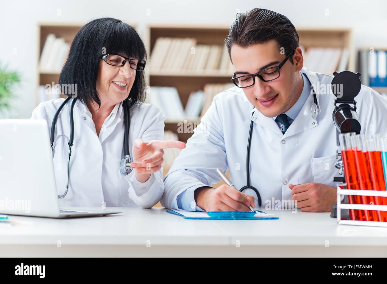 Two doctors working in the lab Stock Photo - Alamy