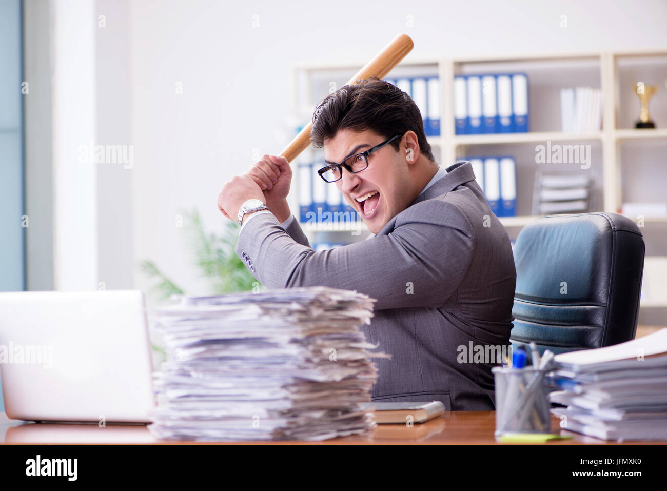 Angry aggressive businessman in the office Stock Photo - Alamy