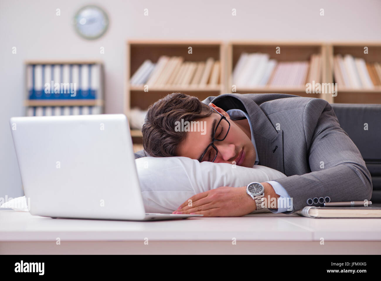 Tired man sleeping at home having too much work Stock Photo - Alamy